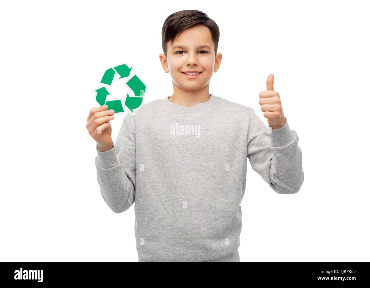 boy with green recycling sign showing thumbs up Stock Photo - Alamy