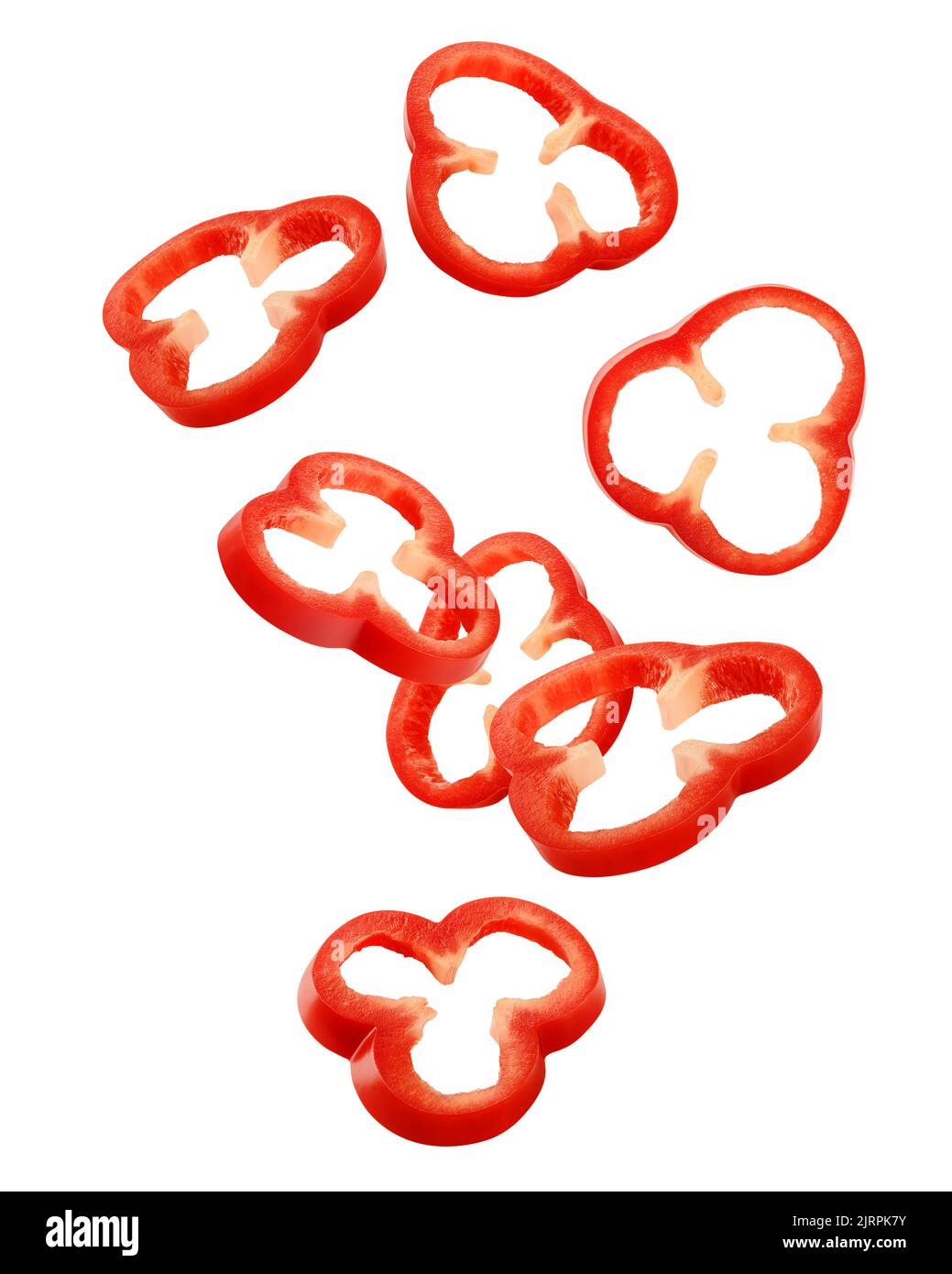 Falling sweet pepper slices, paprika, isolated on white background ...