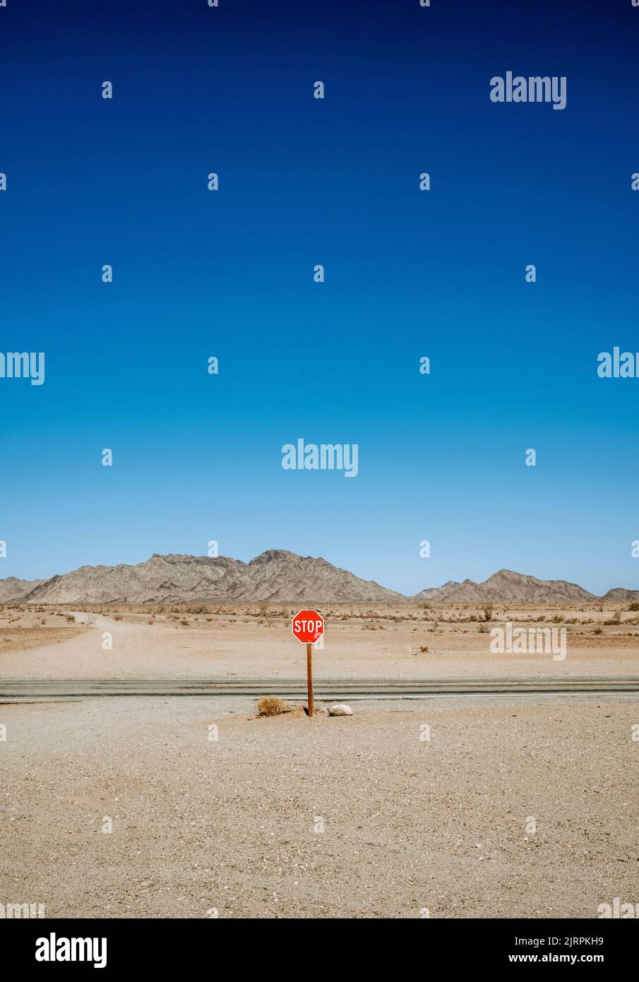 Stop sign in barren rural dry desert landscape, California Stock Photo ...
