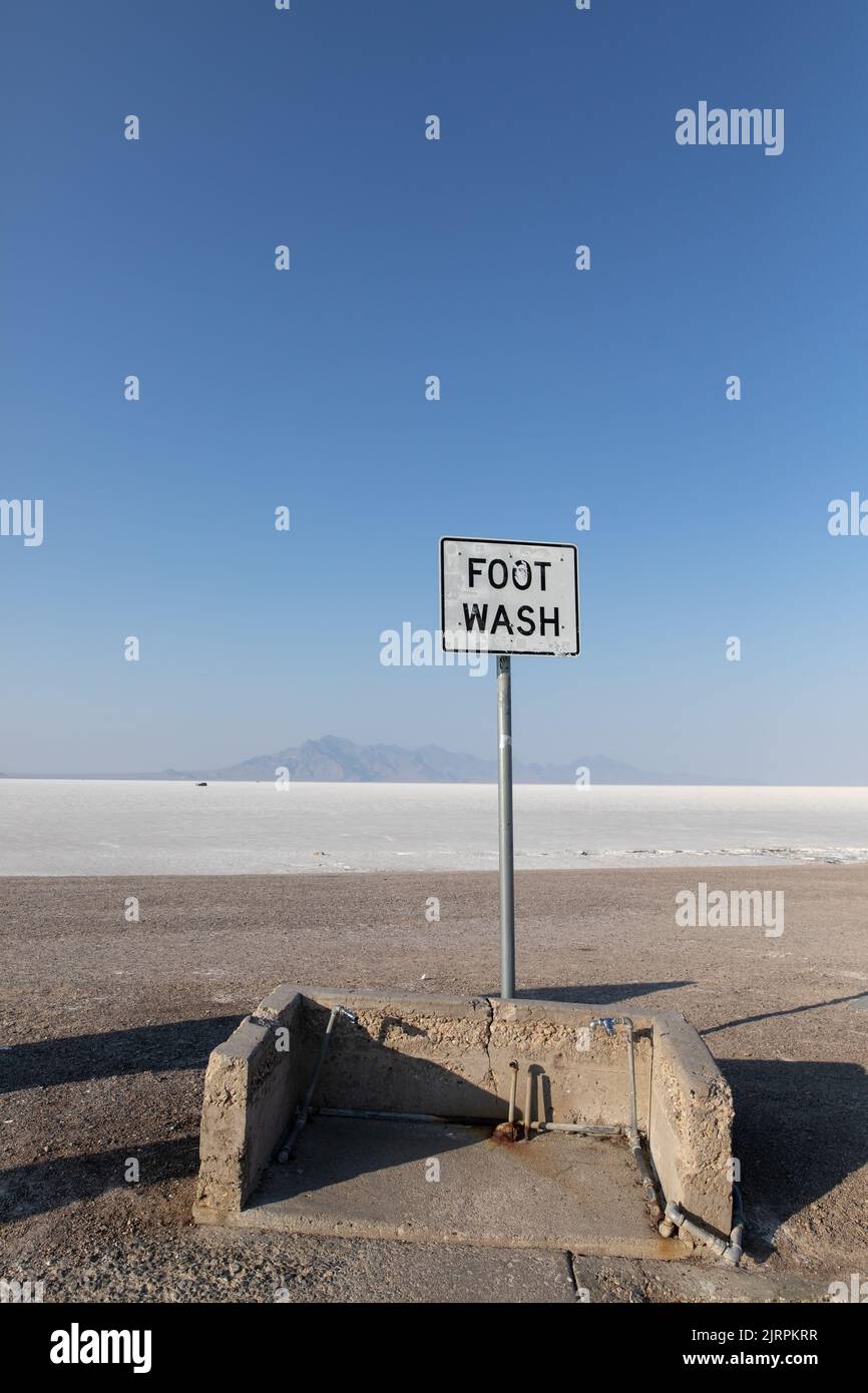 Foot wash sign at Bonneville Salt Flats in Utah Stock Photo - Alamy