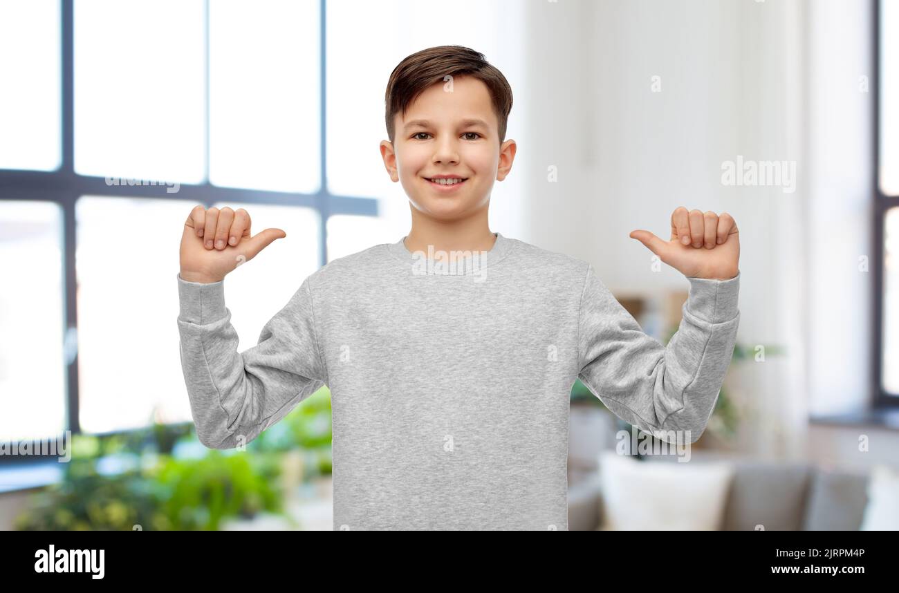 happy smiling boy pointing fingers at himself Stock Photo - Alamy