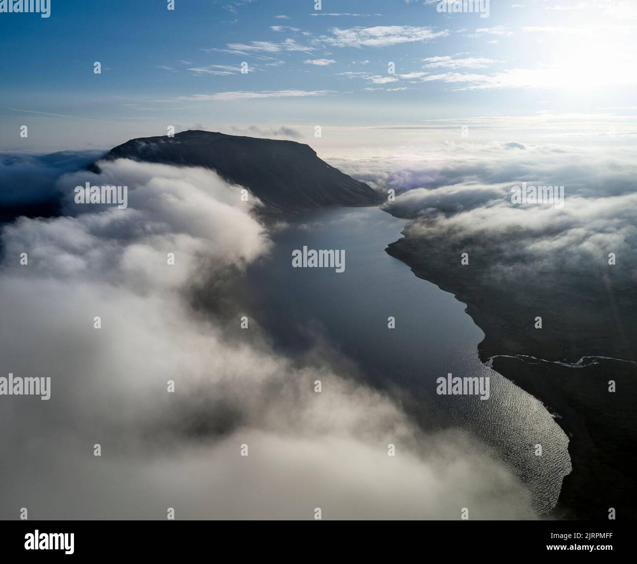 Aerial clouds float over mountains hi-res stock photography and images ...