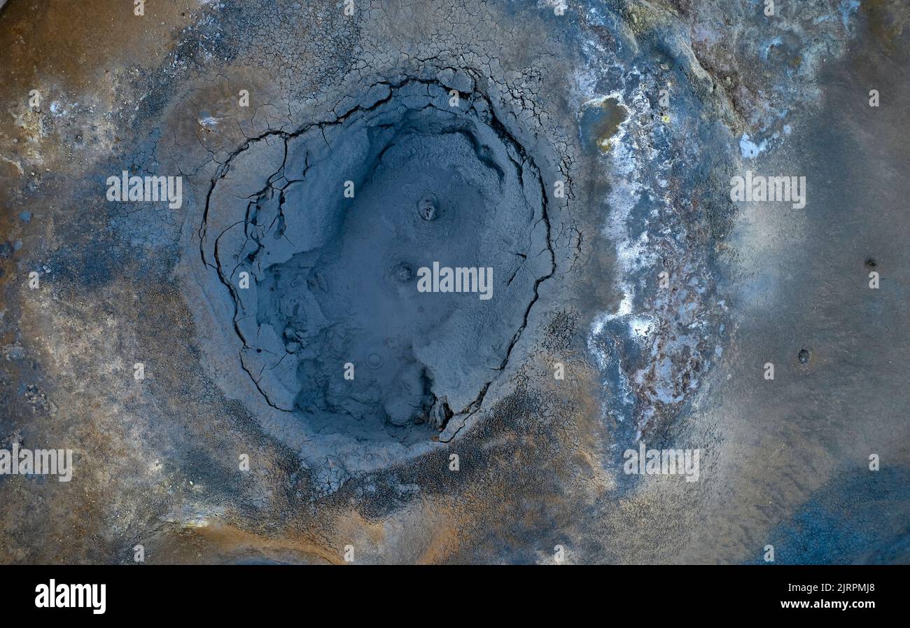 Pool with bubbling mud in volcanic terrain Stock Photo - Alamy