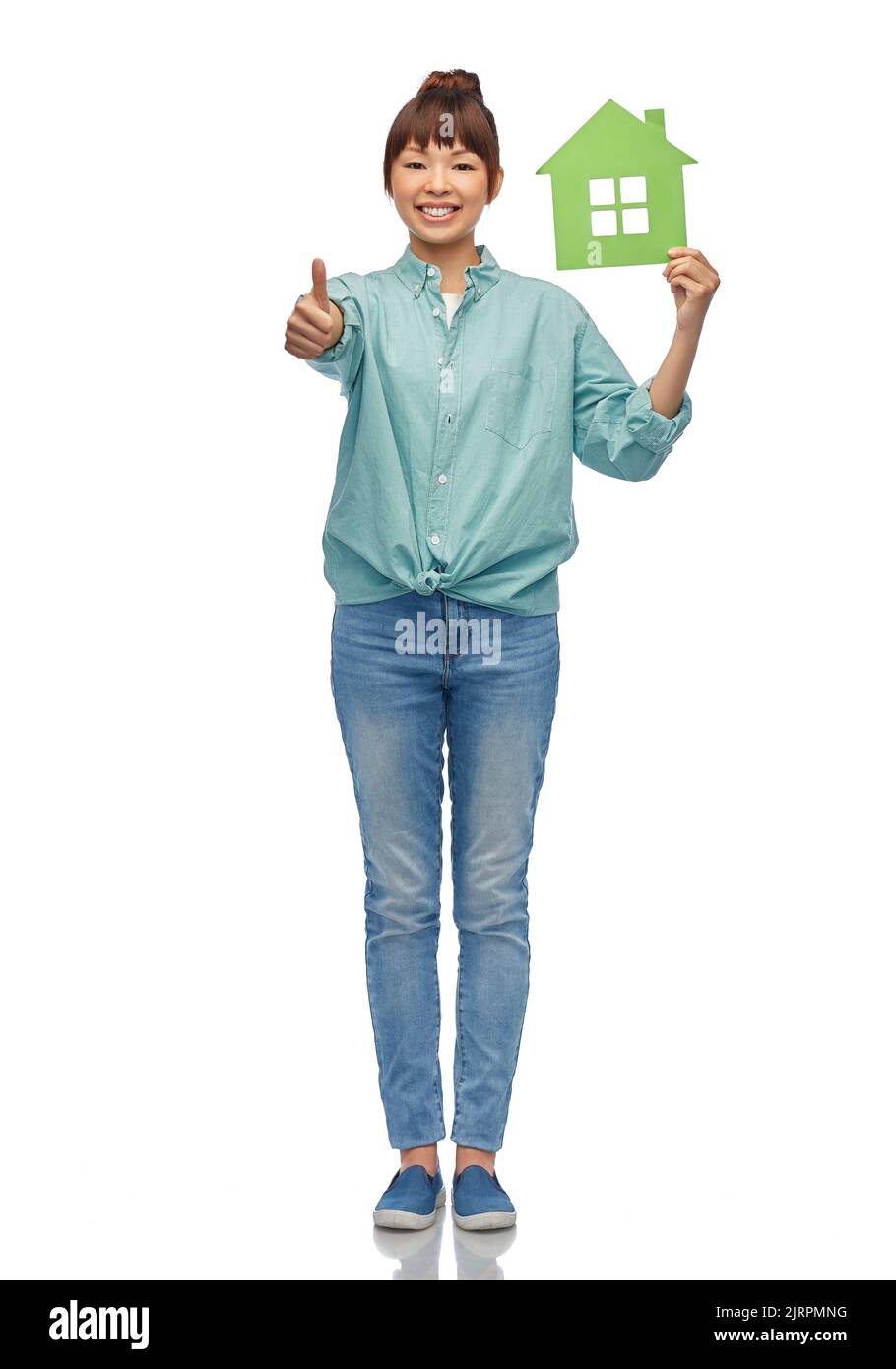 Woman thumbs up home Cut Out Stock Images & Pictures - Alamy