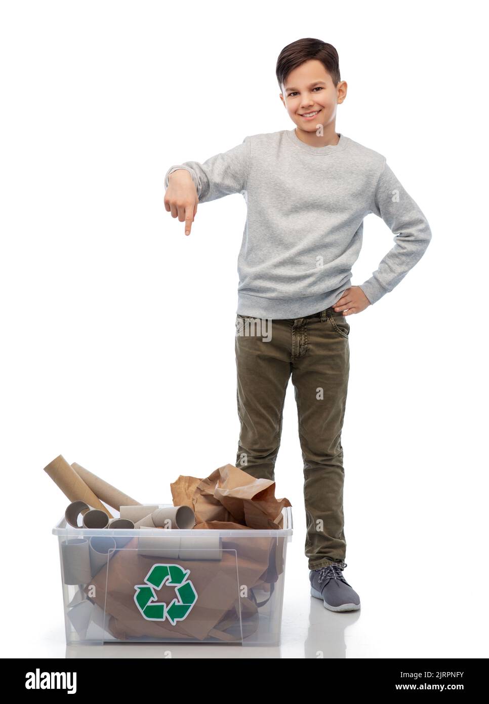 smiling boy sorting paper waste Stock Photo - Alamy