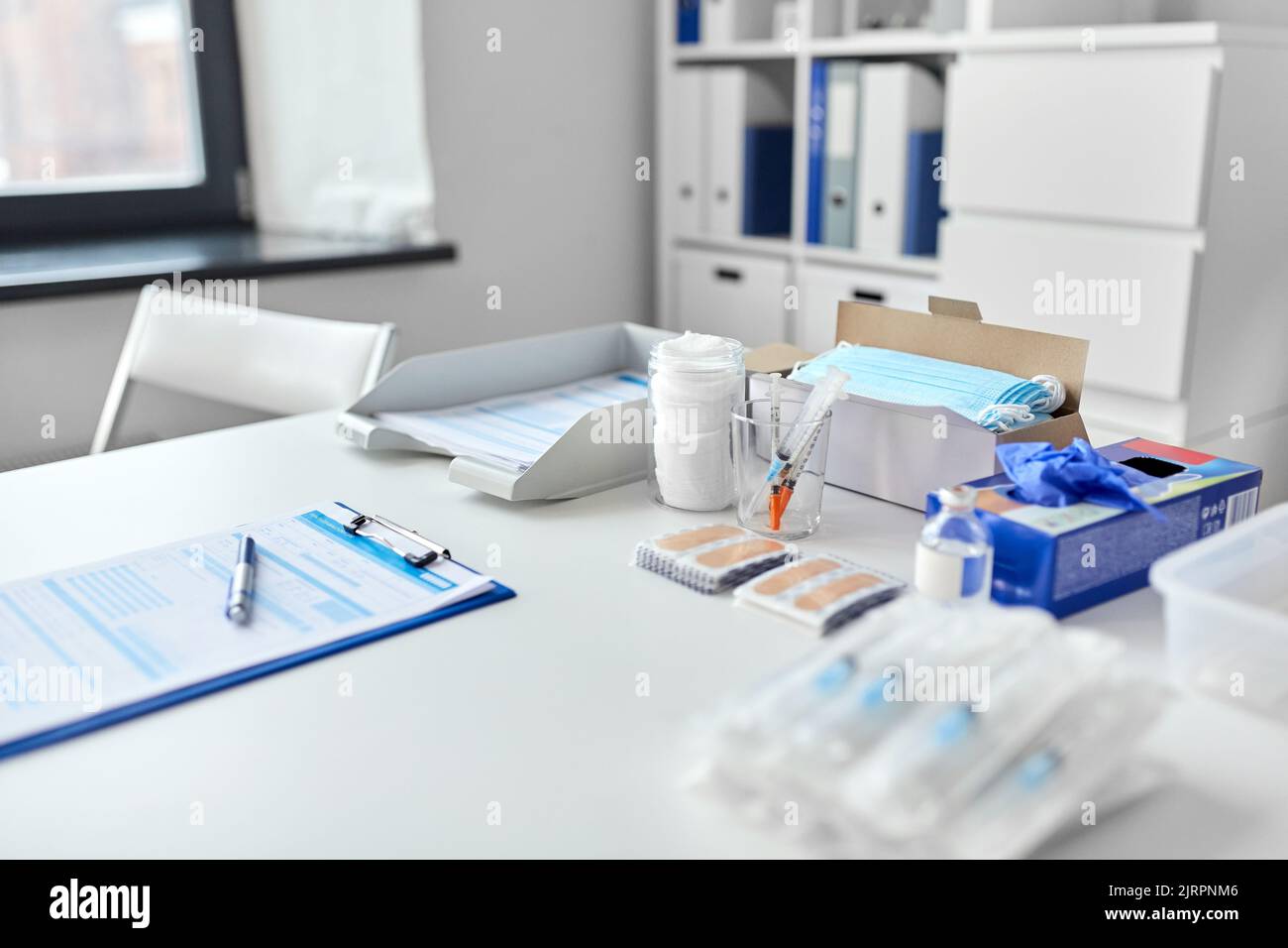 syringes and medicine on table at hospital Stock Photo - Alamy