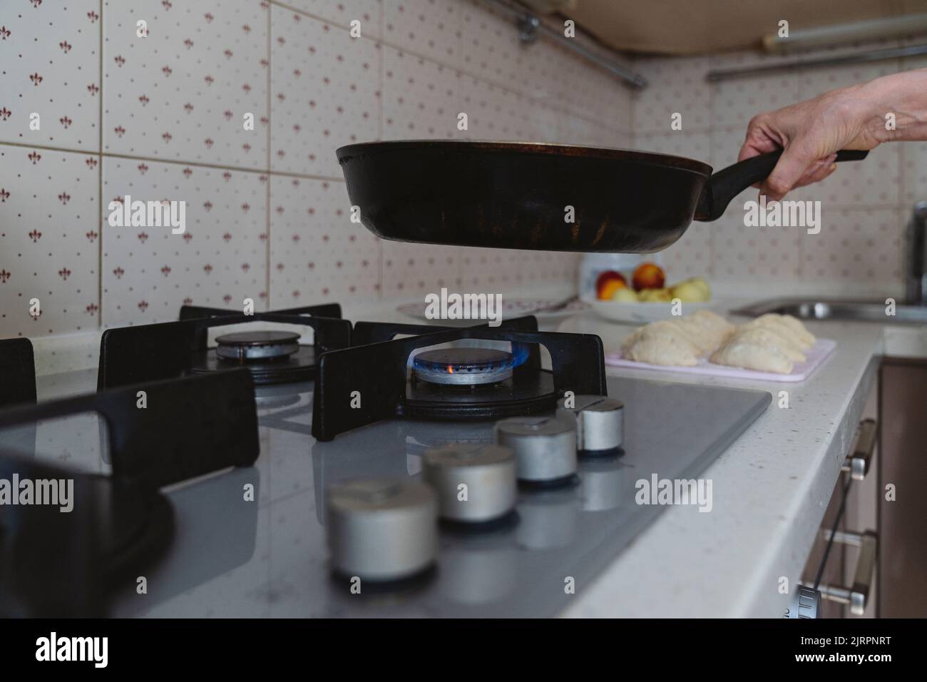 Frying pan on gas stove hi-res stock photography and images - Alamy
