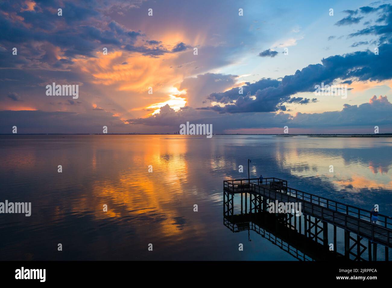 Mobile Bay Pier at sunset Stock Photo - Alamy