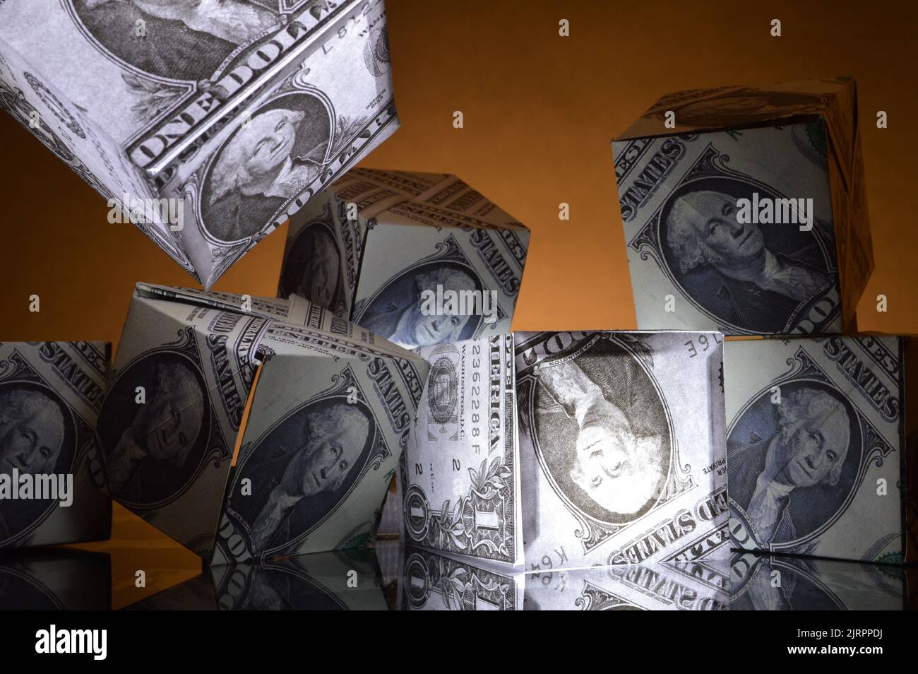 Cubes dollar hi-res stock photography and images - Alamy