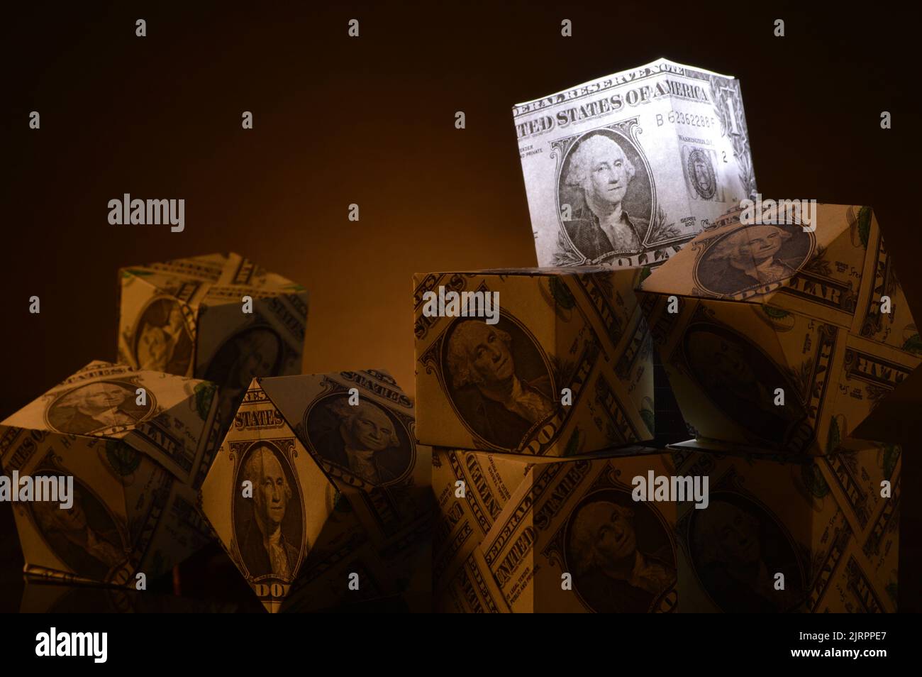 Cubes dollar hi-res stock photography and images - Alamy