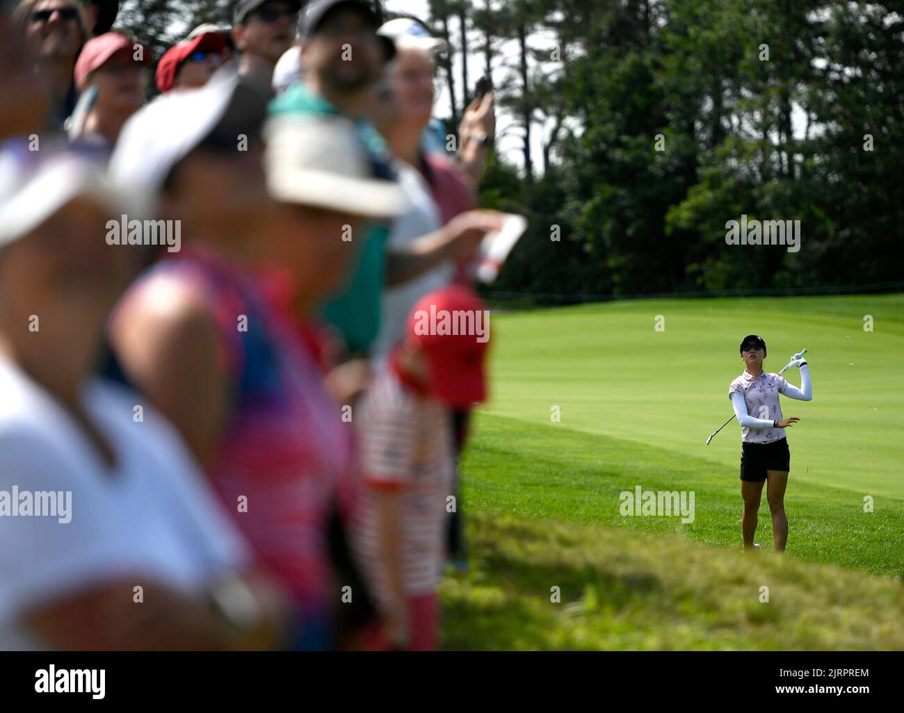 New Zealand's Lydia Ko and fans look for the ball after she hit it from ...