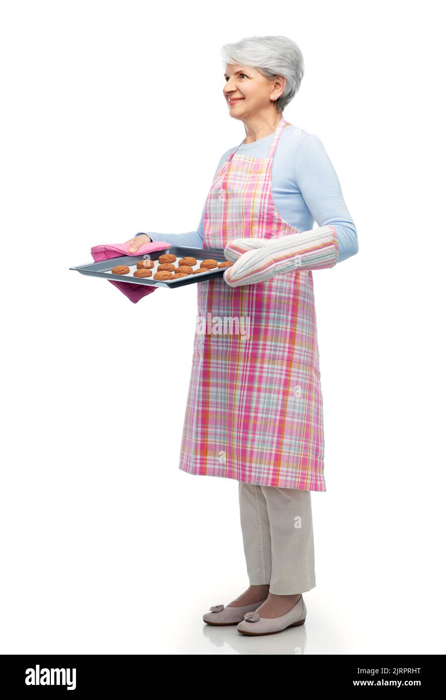 Old woman baking cookies hi-res stock photography and images - Alamy