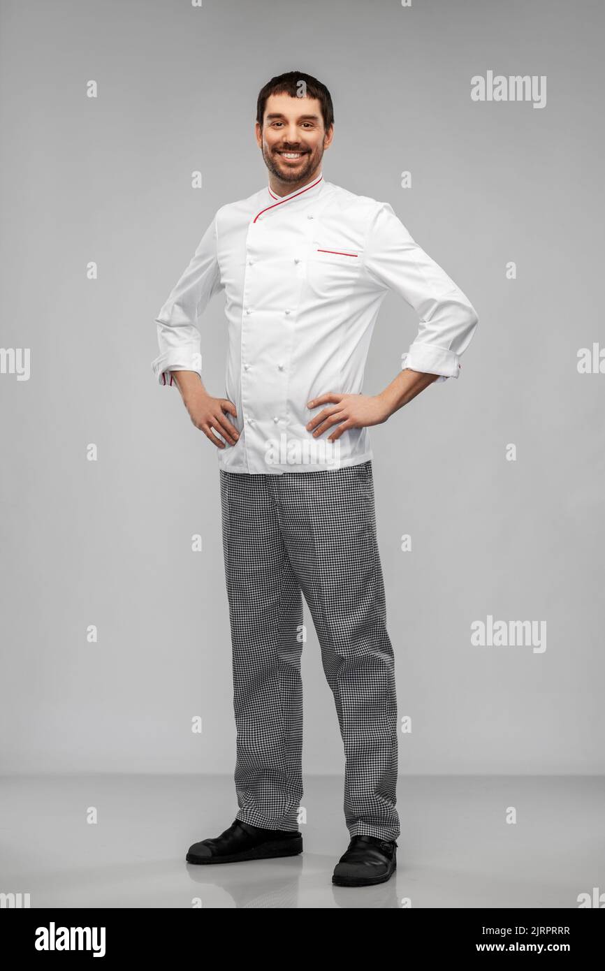 Smiling young male chef hi-res stock photography and images - Alamy