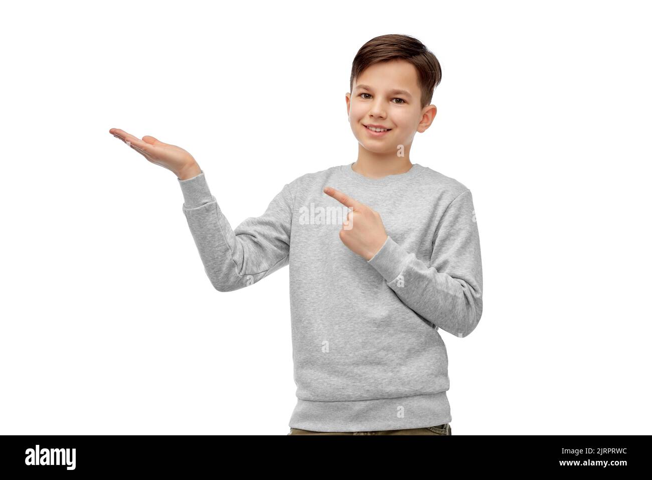 happy boy holding something imaginary on hand Stock Photo - Alamy