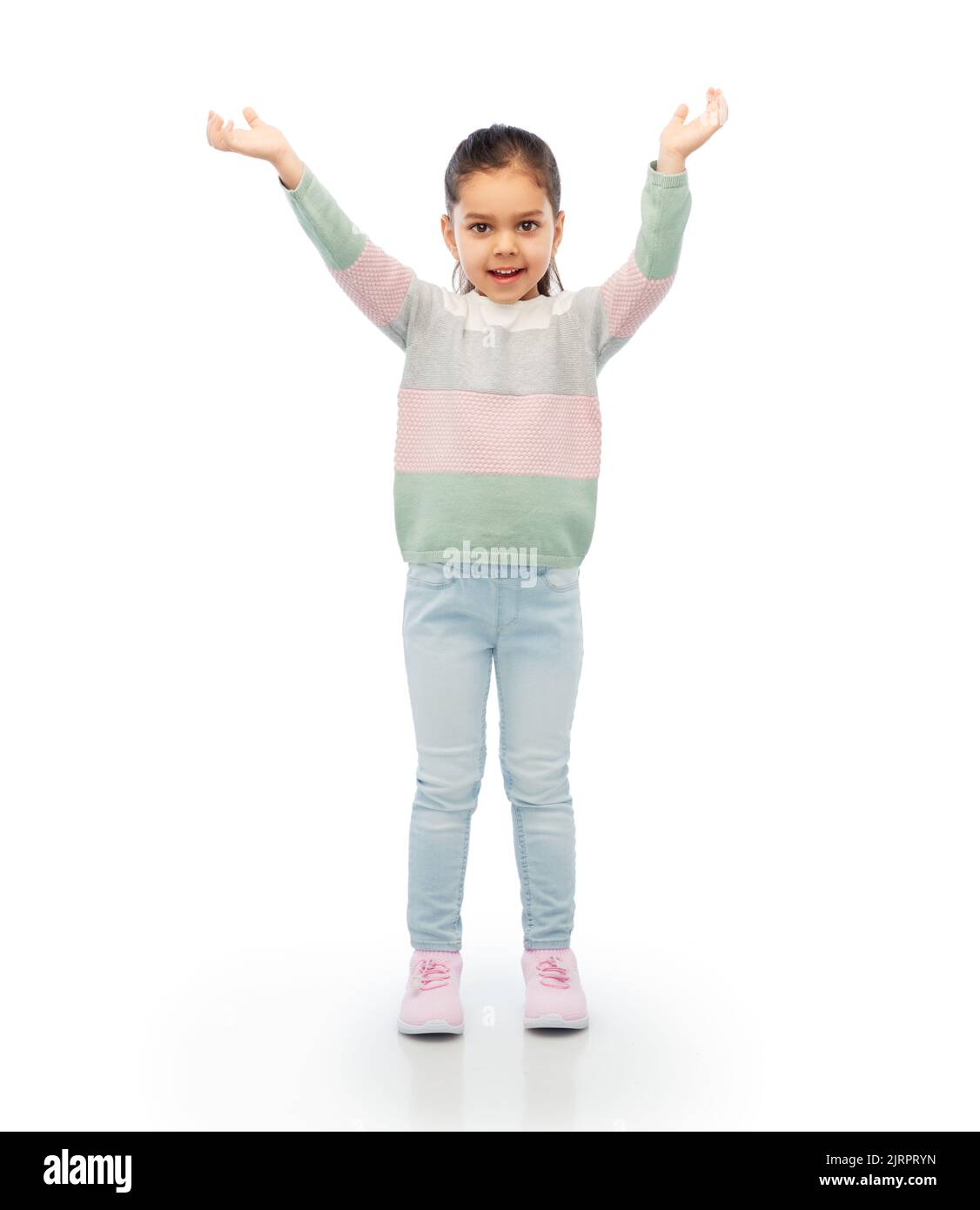 happy girl with raised arms over white background Stock Photo - Alamy