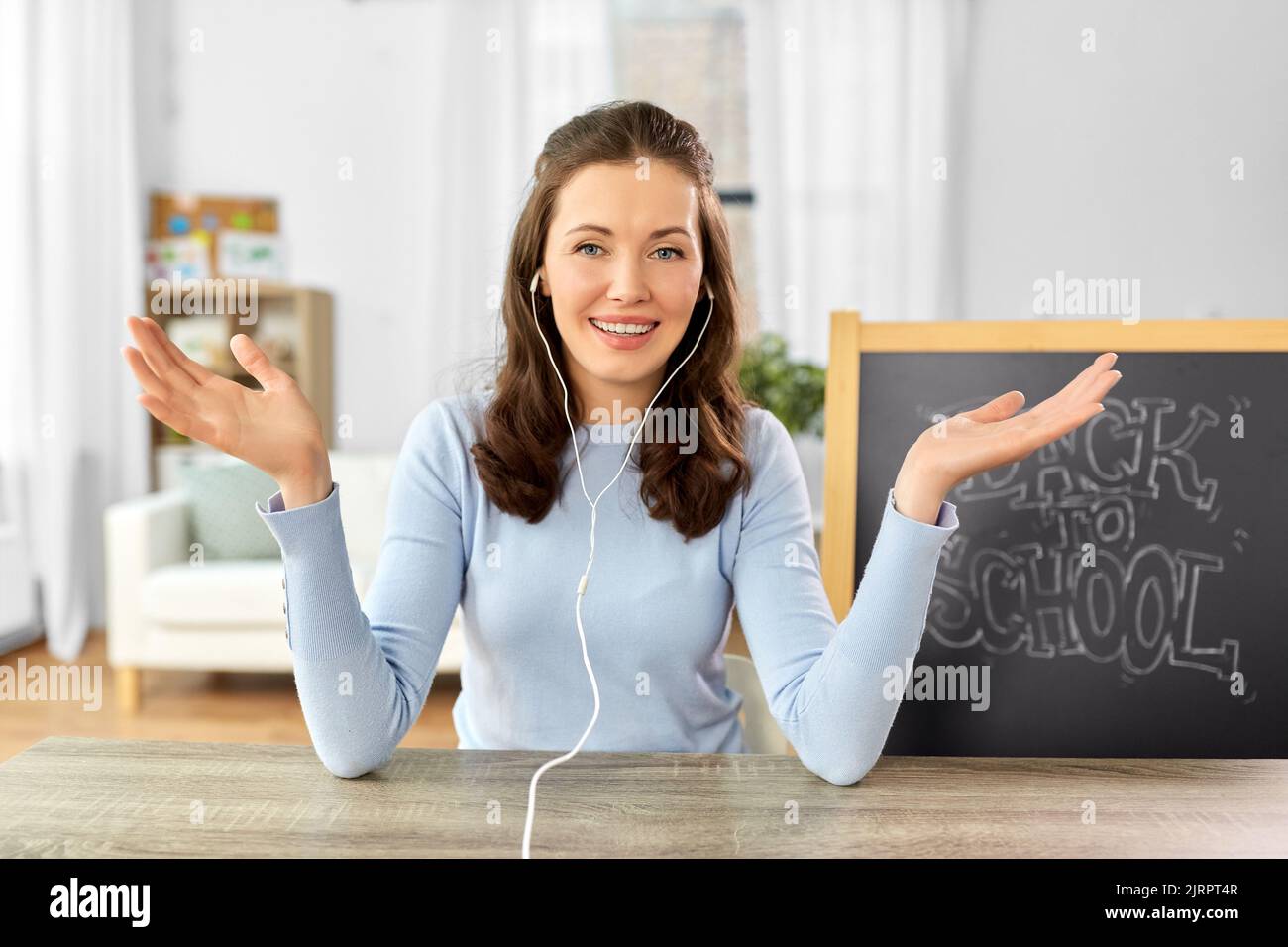 teacher having online class or video call at home Stock Photo - Alamy