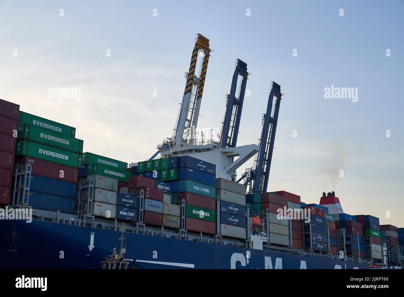 Containers stack on ship deck. Container loading in Cargo freight ship ...