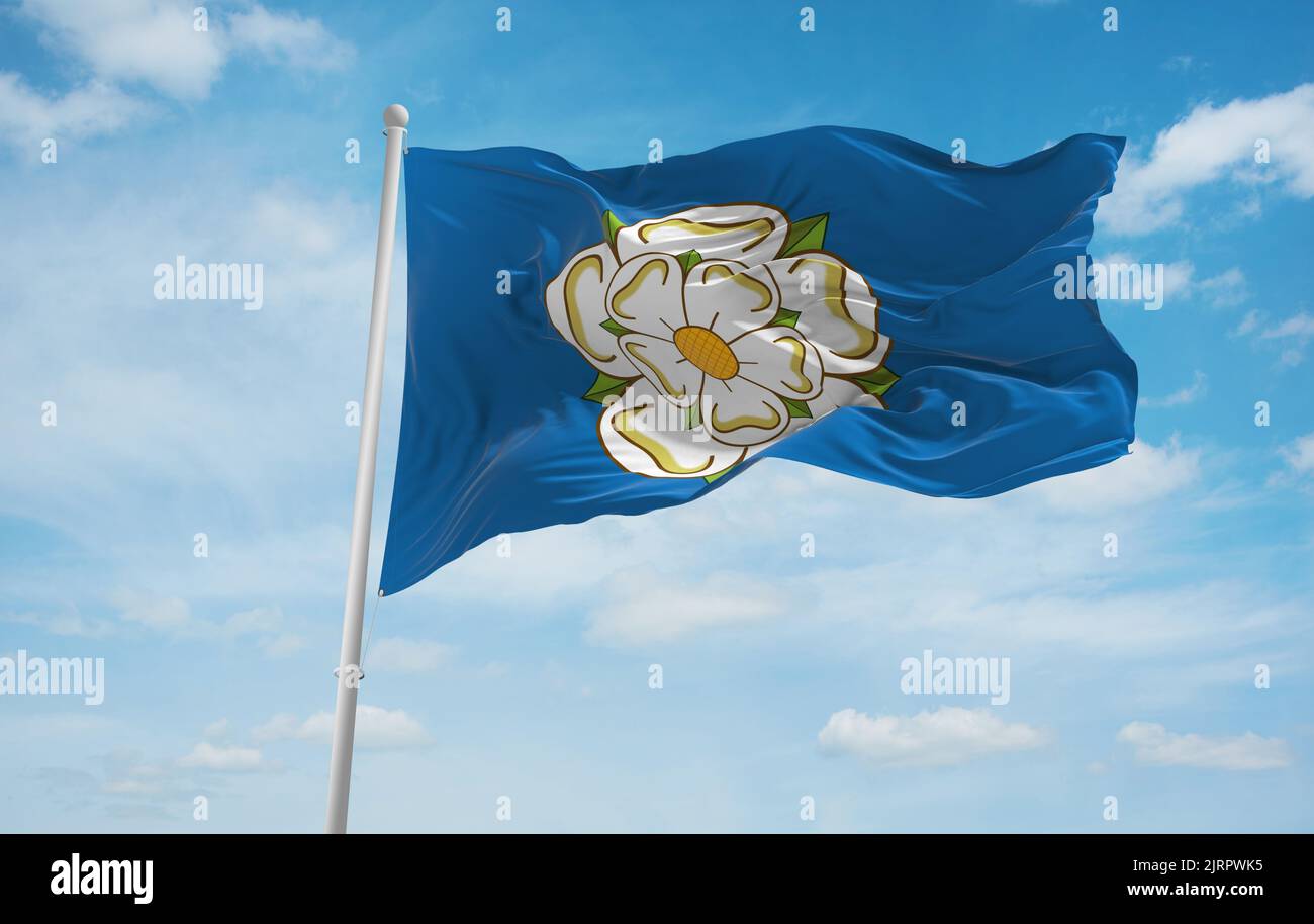 flag of Anglo-Frisian peoples Yorkshire people at cloudy sky background ...