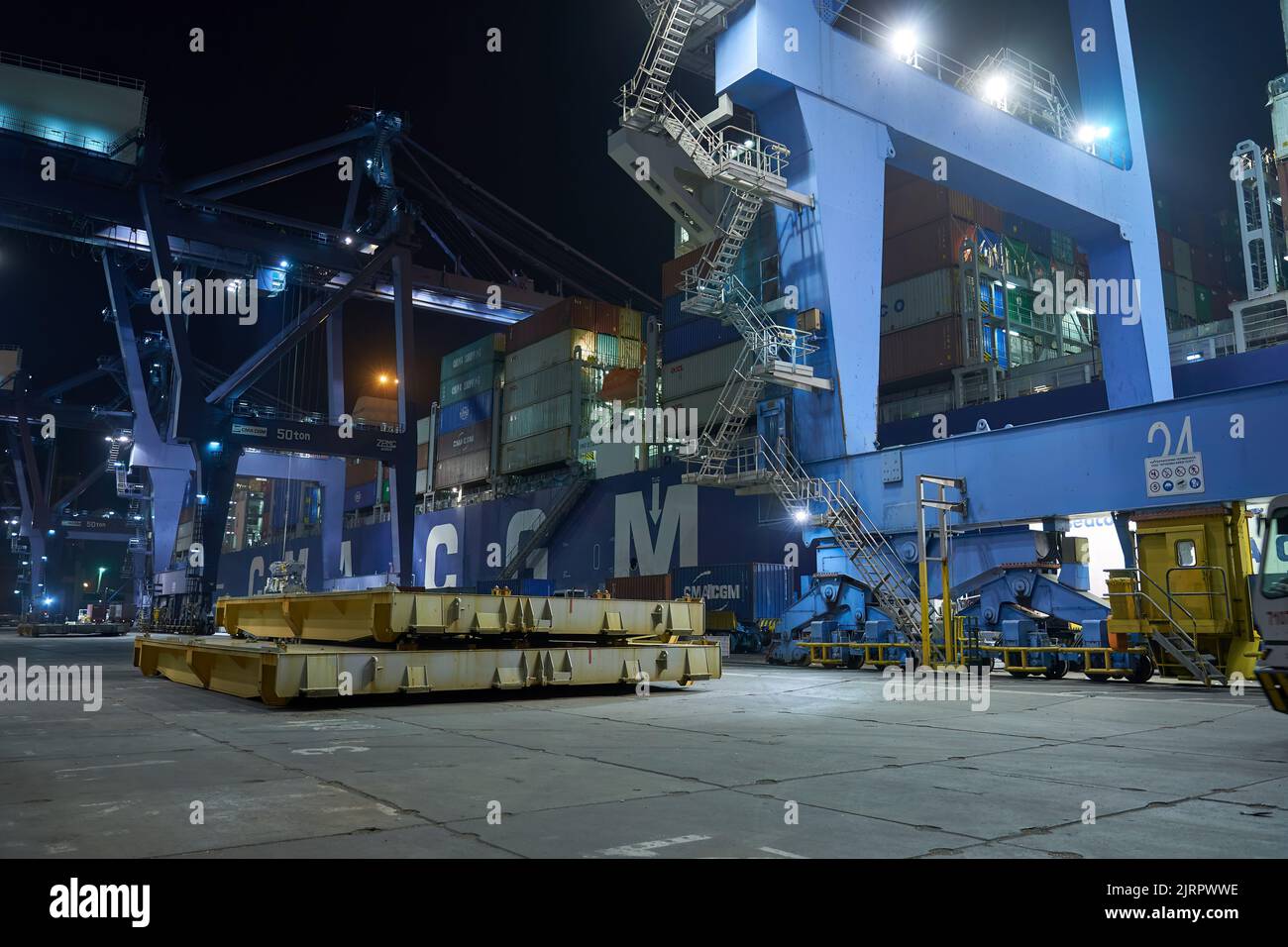 Container ship hold hatch at the terminal. The hold hatch lies on the ...