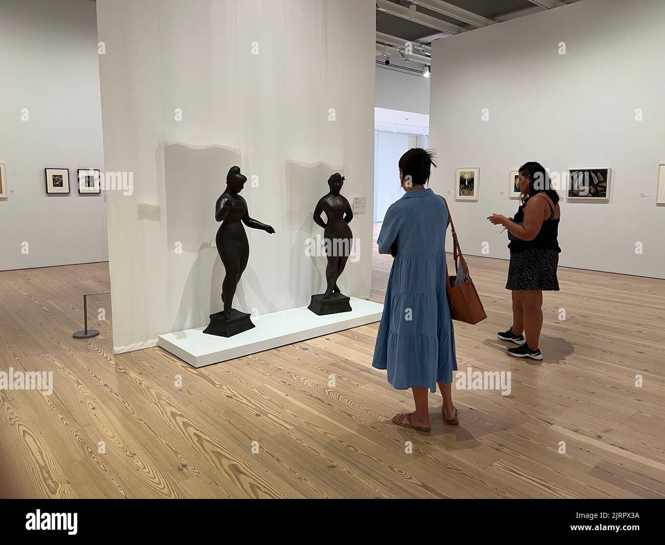 Women viewing "Standing Female Figures, 1925-26, by Elie Nadelman ...
