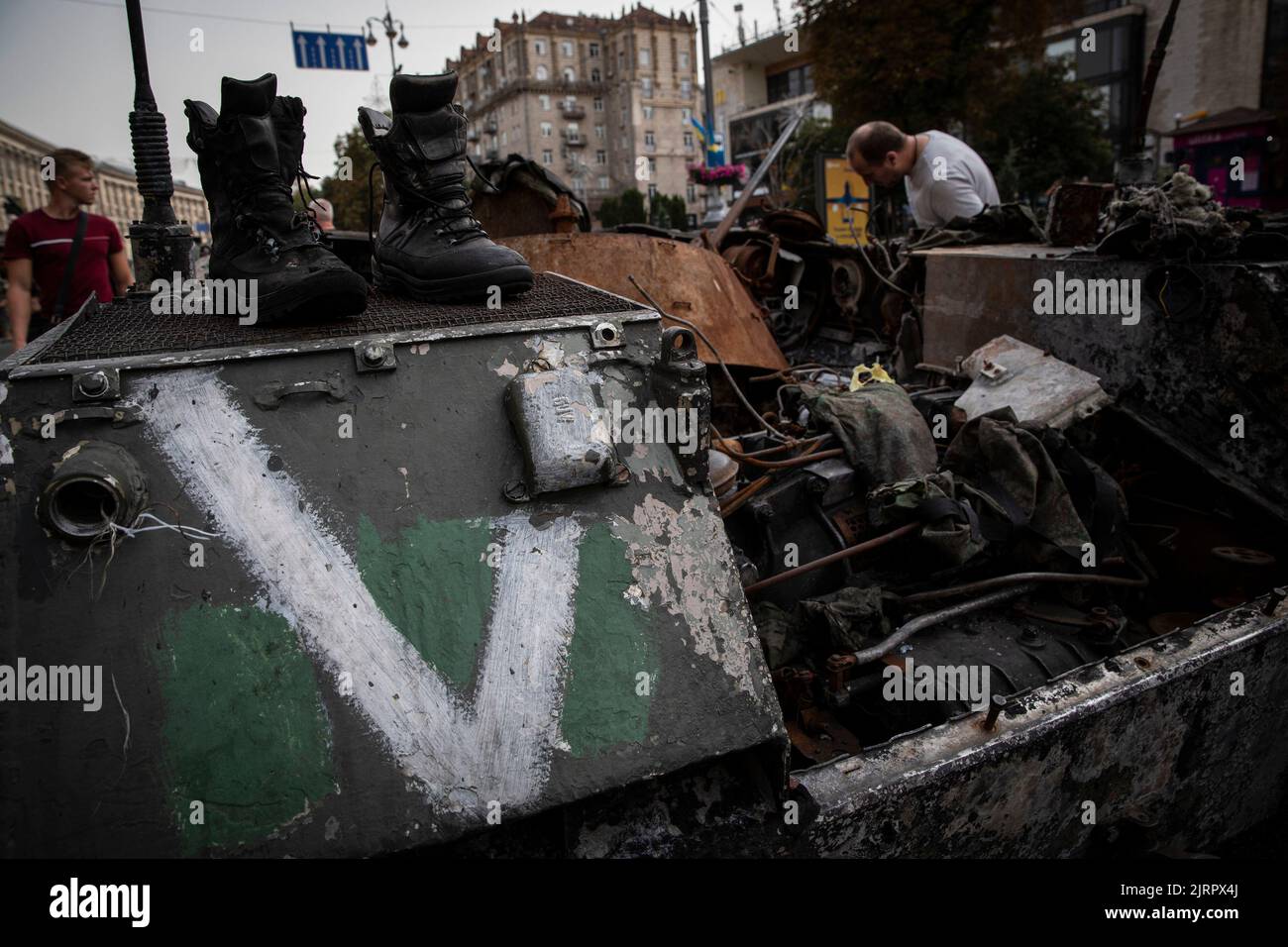 Display of Russian military boots placed on the wreckage of a destroyed ...