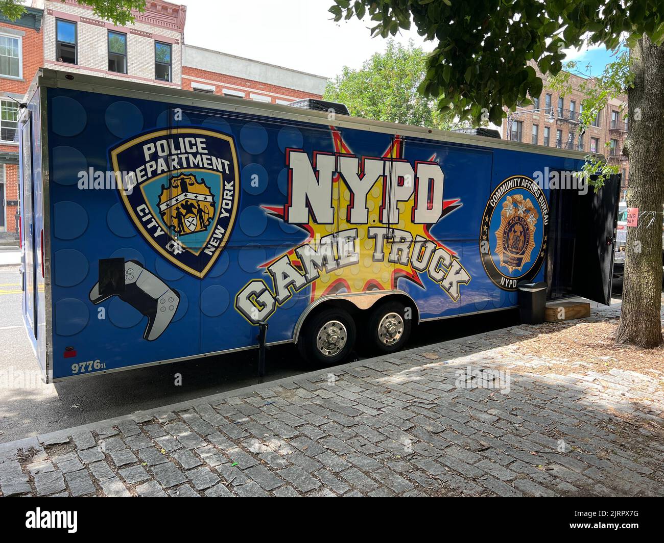 NYPD Game Truck with video games within for kids as part of a summer ...