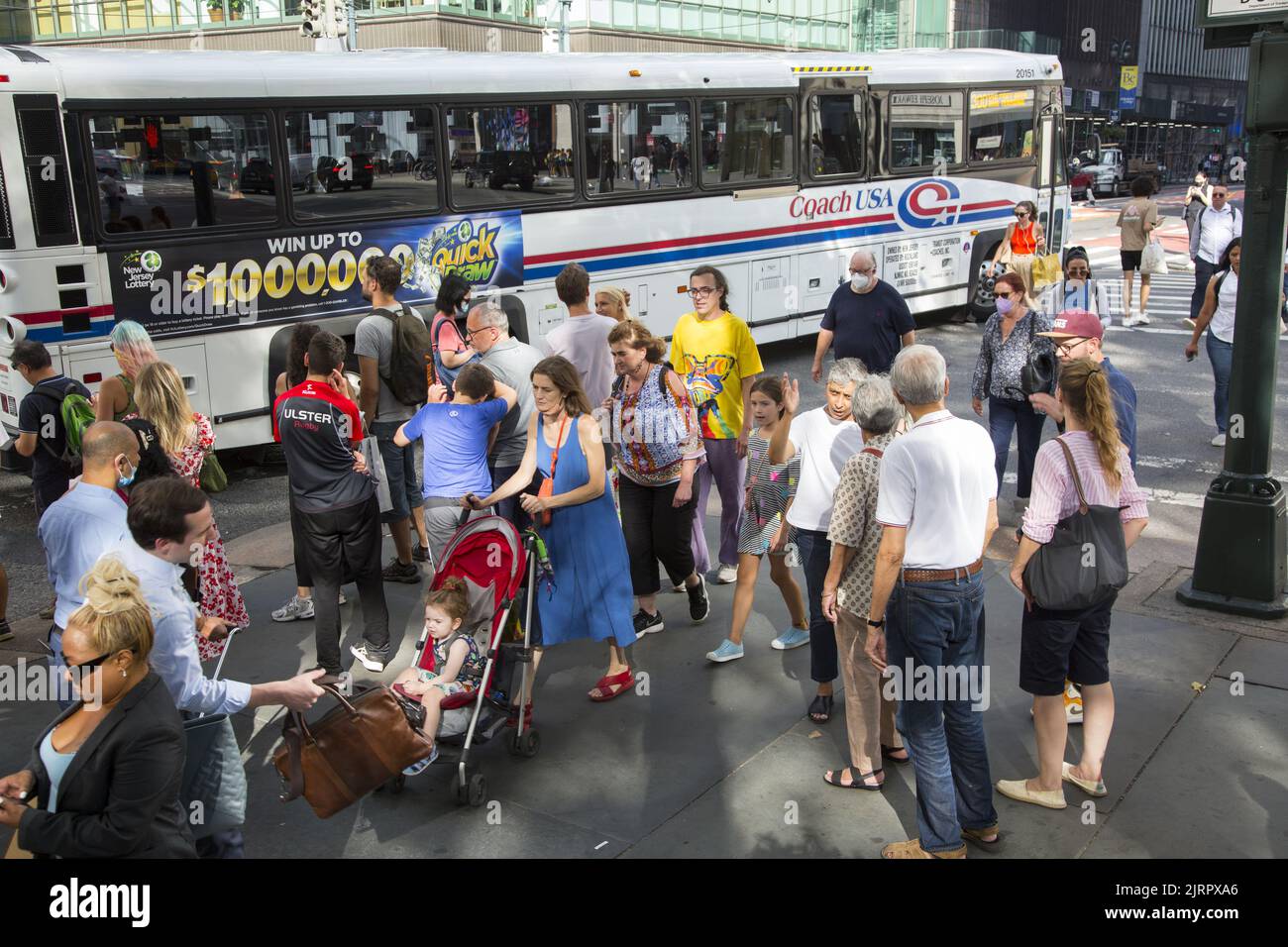 42nd Street at 5th Avenue is always crowded with pedestrians on the ...