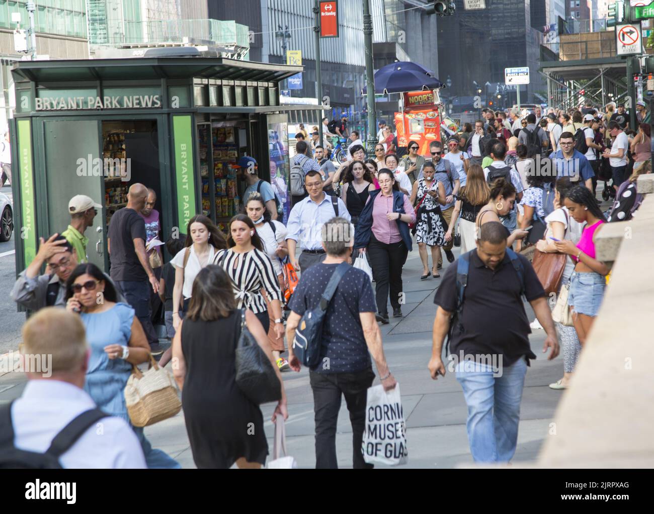 42nd Street at 5th Avenue is always crowded with pedestrians on the ...