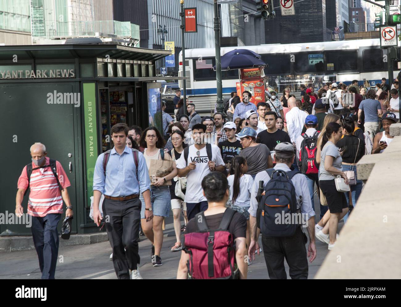 42nd Street at 5th Avenue is always crowded with pedestrians on the ...
