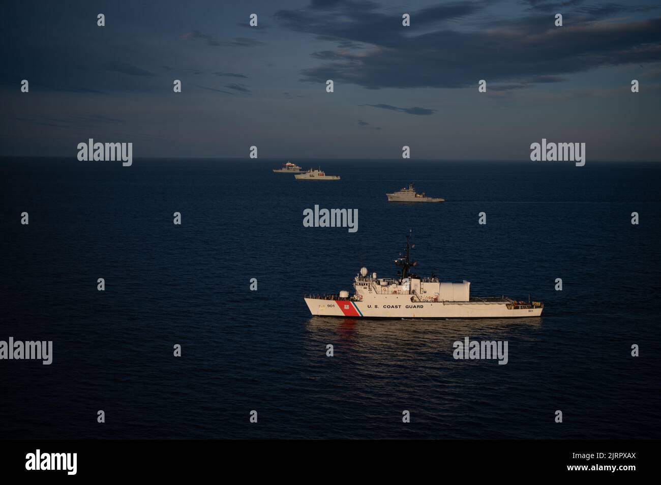 USCGC Bear (WMEC 901) is seen from the left side of a formation during ...