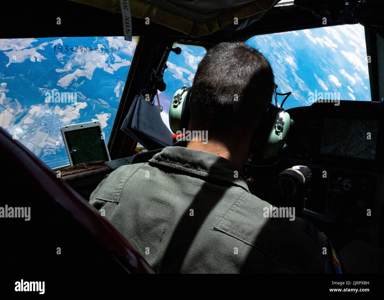 U.S. Air Force 23rd Expeditionary Bomb Squadron Pilot Capt. Ryan “Clipper” Reers monitors his B ...