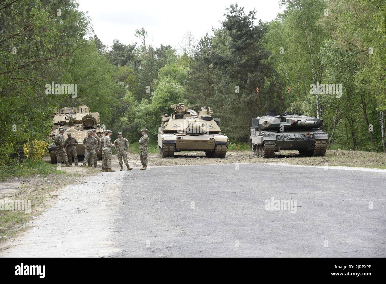 Soldiers prepare to cross the River Kwisa on tanks using the newly ...
