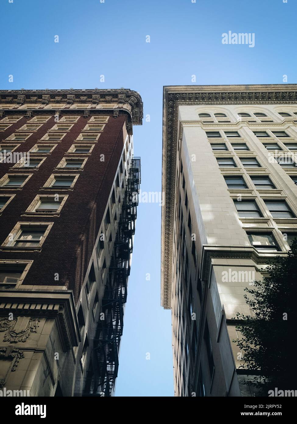 Two tall building rising high in the sky Stock Photo - Alamy