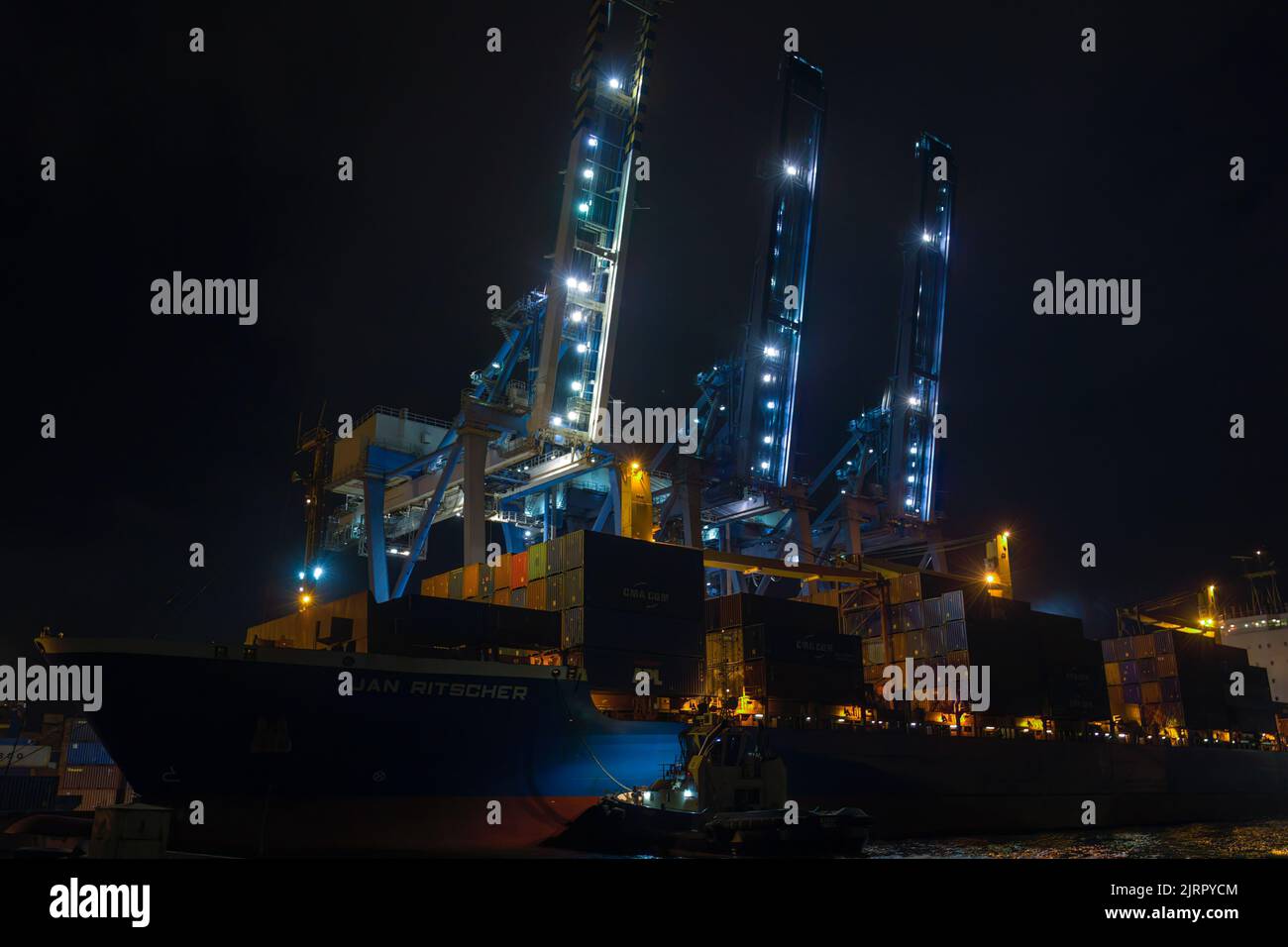 Containers loading by crane in the night , Trade Port. container ...