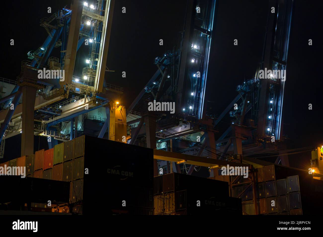 Containers loading by crane in the night , Trade Port. container ...