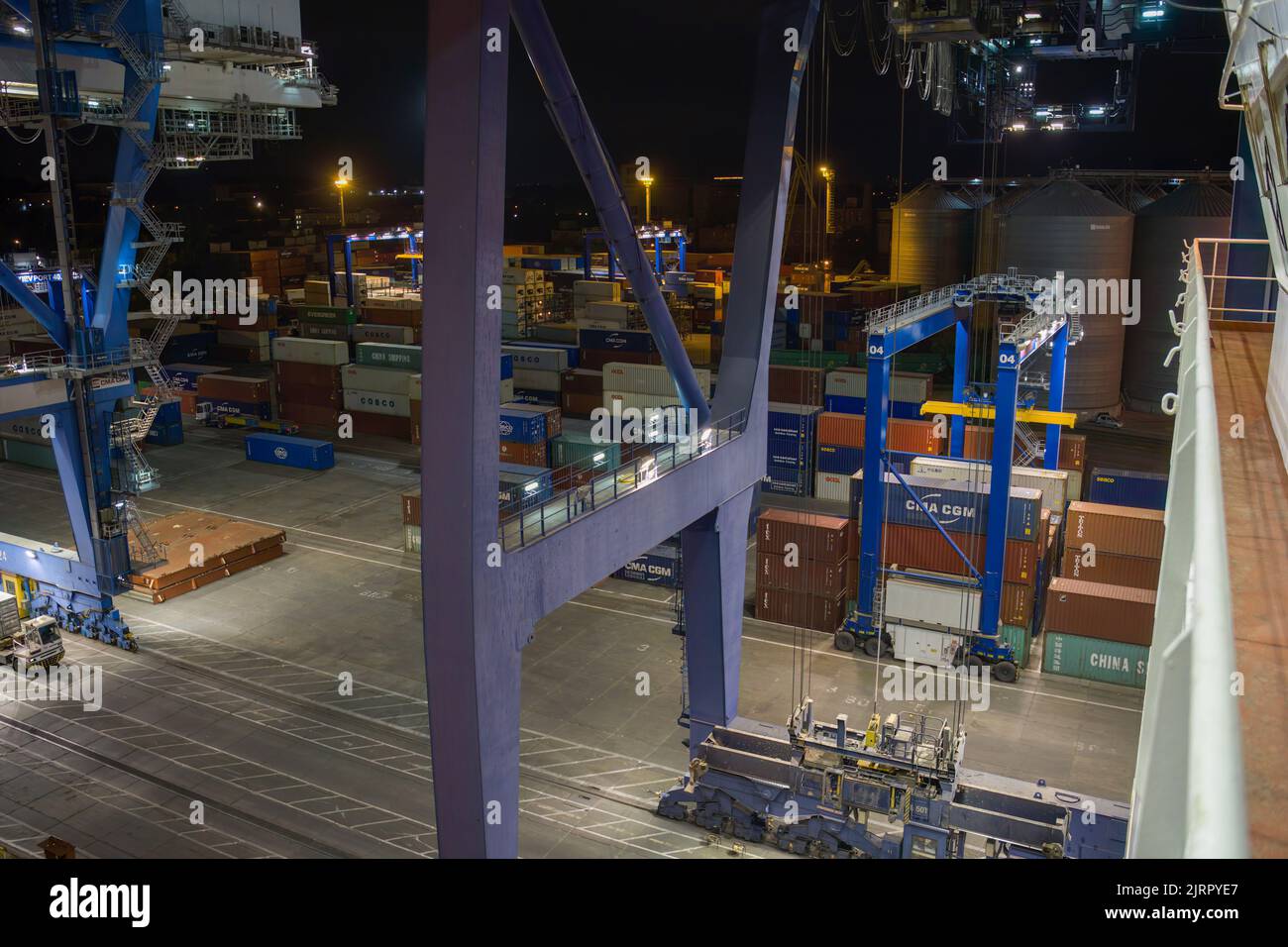 Containers loading by crane in the night , Trade Port. container operation in port series Stock ...