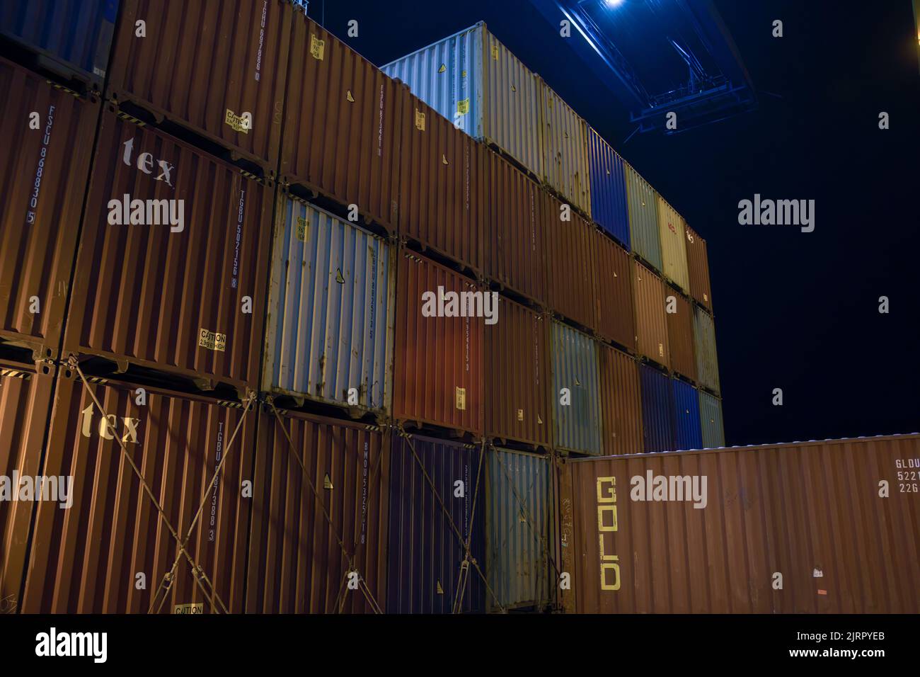 Containers loading by crane in the night , Trade Port. container ...