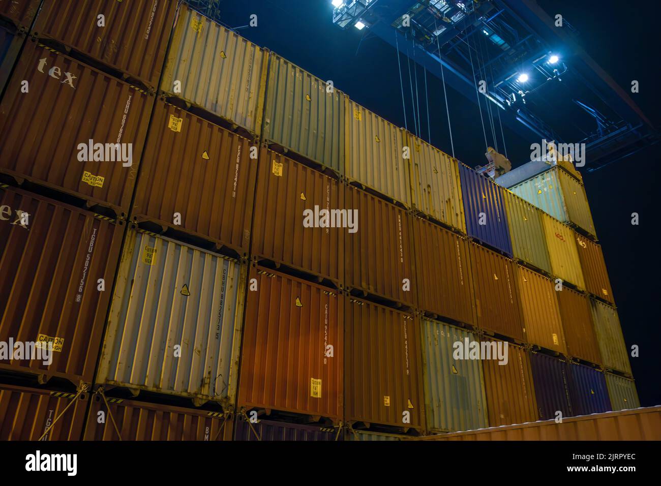 Containers loading by crane in the night , Trade Port. container ...