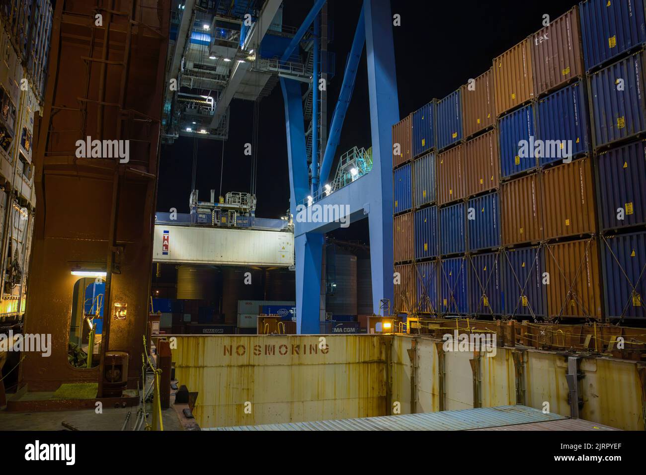 Containers loading by crane in the night , Trade Port. container ...