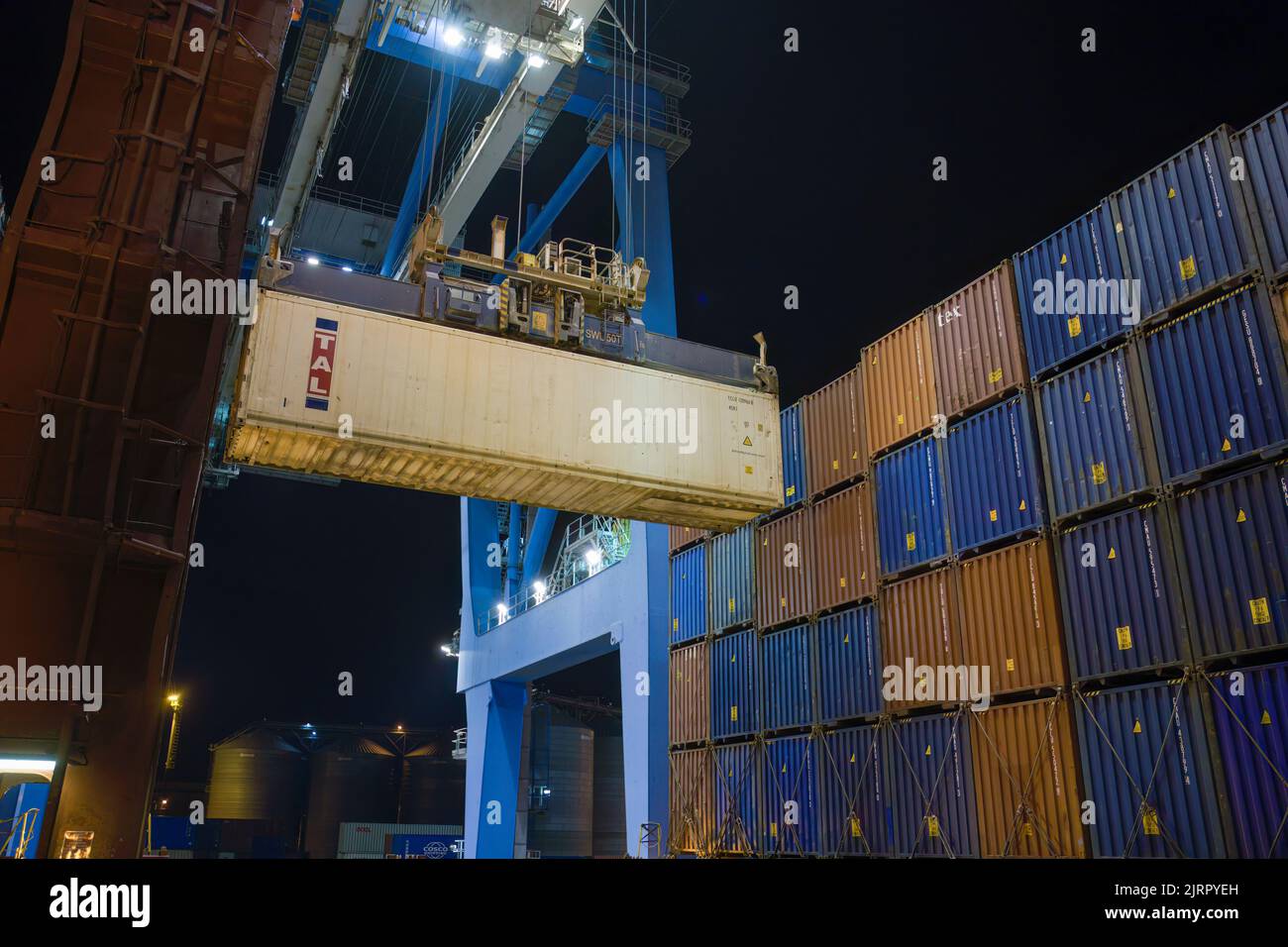 Containers loading by crane in the night , Trade Port. container operation in port series Stock ...