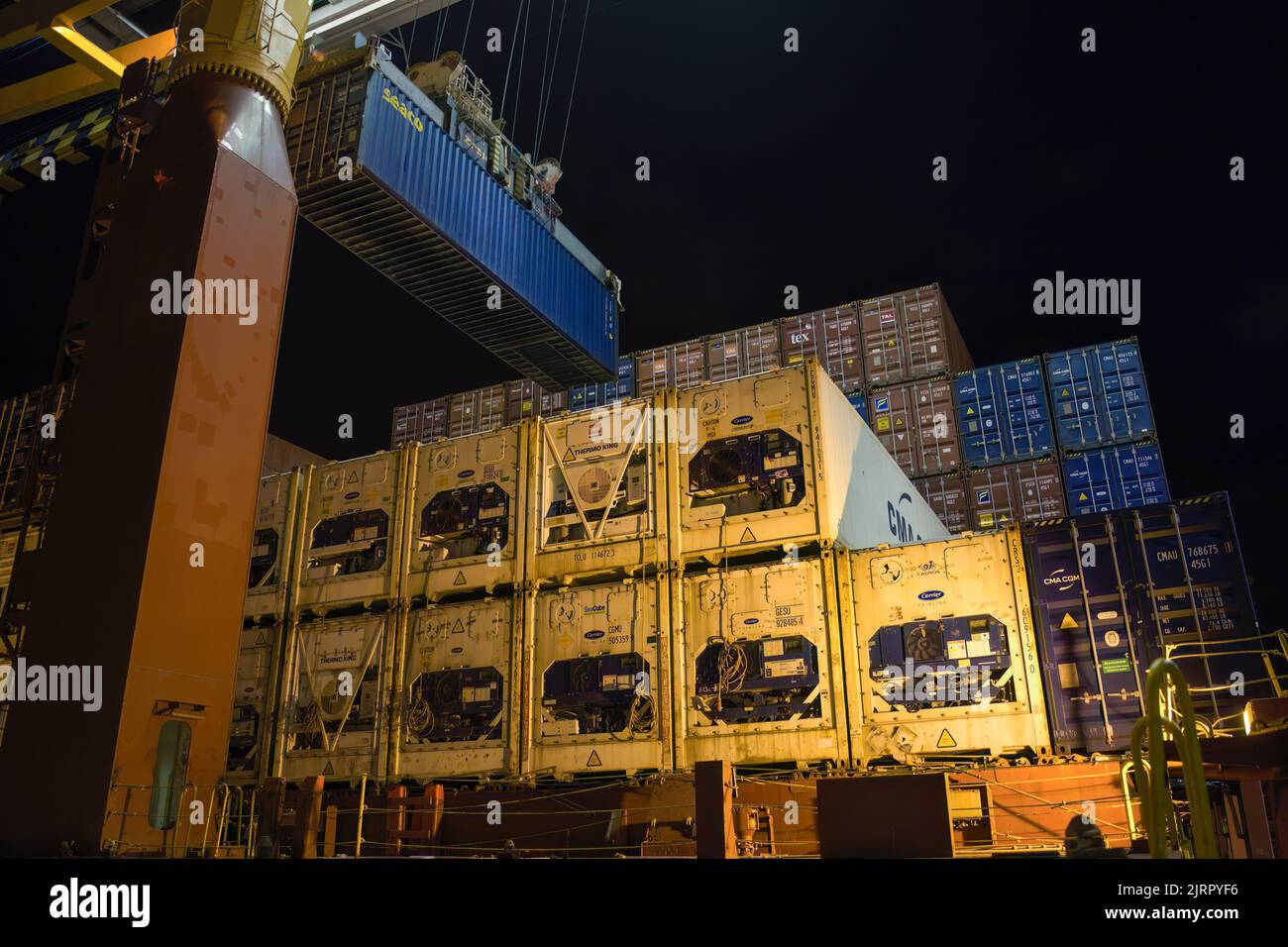 Containers loading by crane in the night , Trade Port. container ...