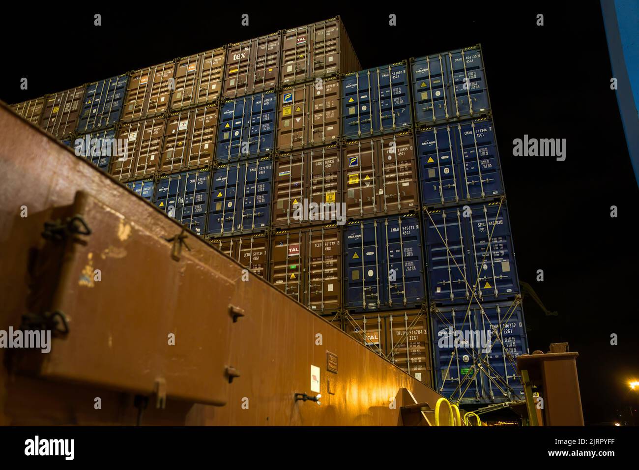 Containers loading by crane in the night , Trade Port. container ...