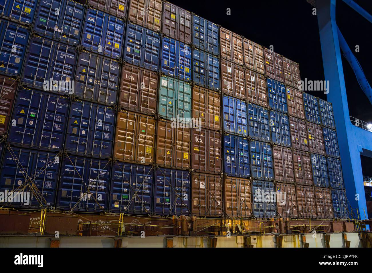 Containers loading by crane in the night , Trade Port. container ...