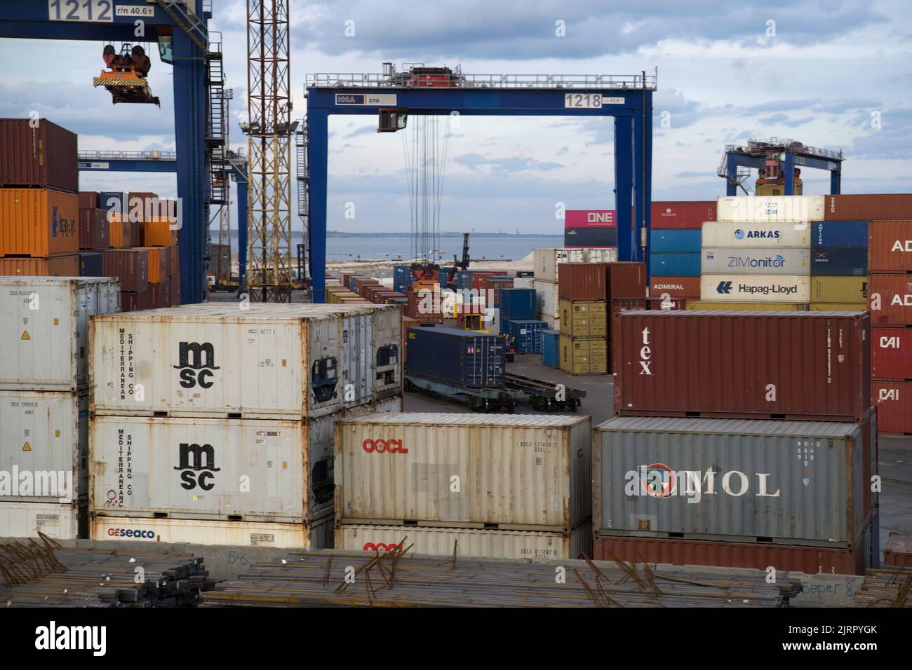 Industrial port with containers and cranes Stock Photo - Alamy