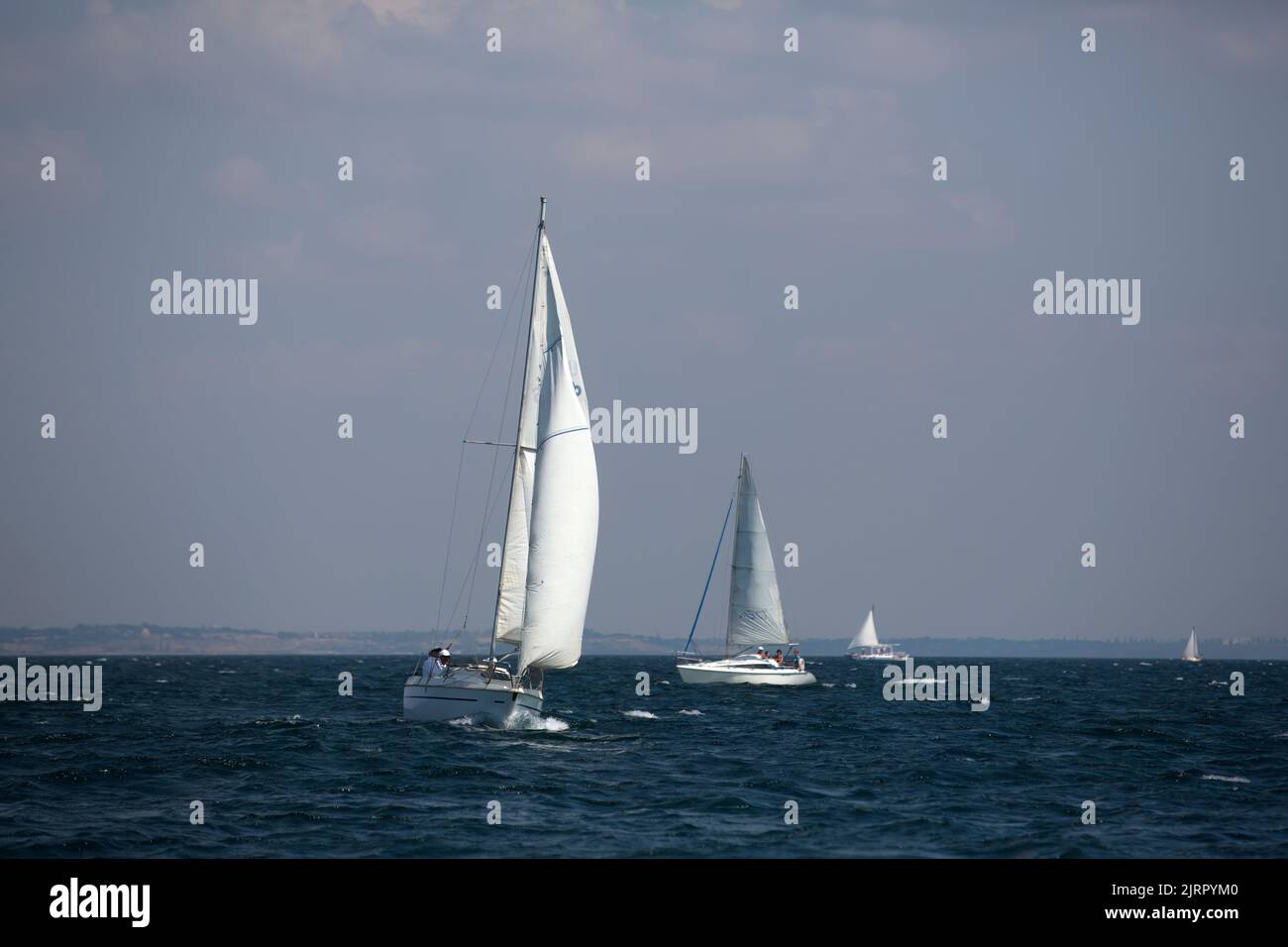 Sailing yacht regatta. Sailboats under sail in the race. Yachting ...