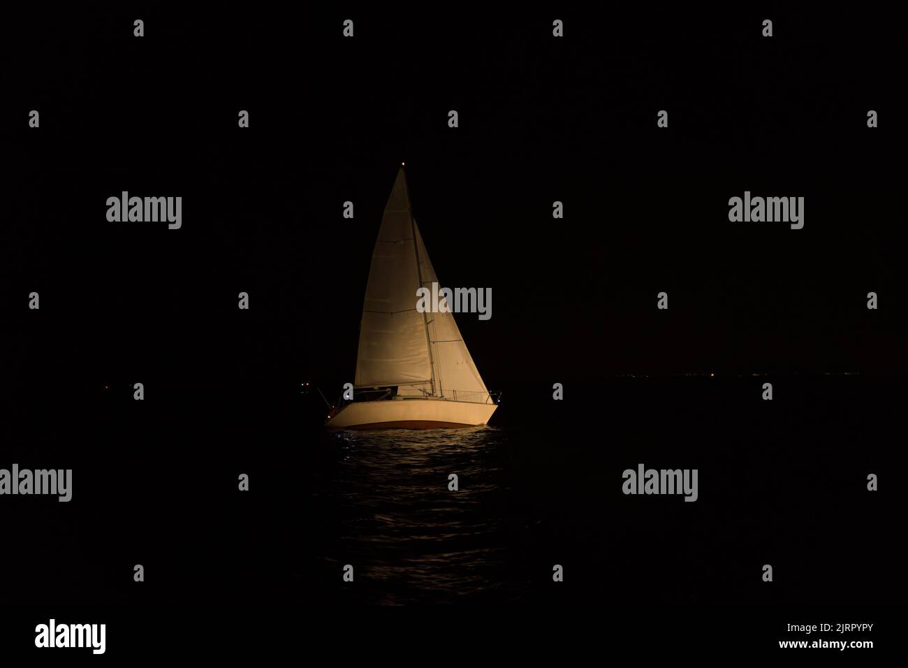 sailing yacht at night Stock Photo - Alamy