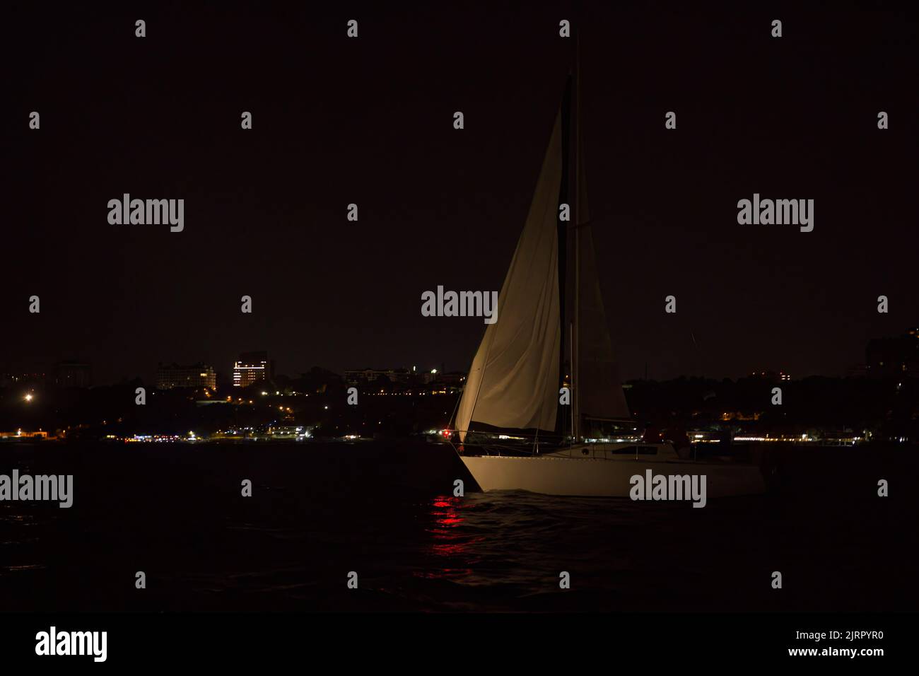 sailing yacht at night Stock Photo - Alamy