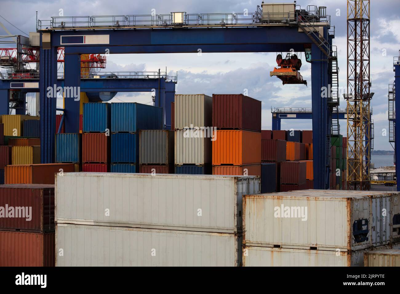 industrial port with containers. Stacks of containers in port at ...
