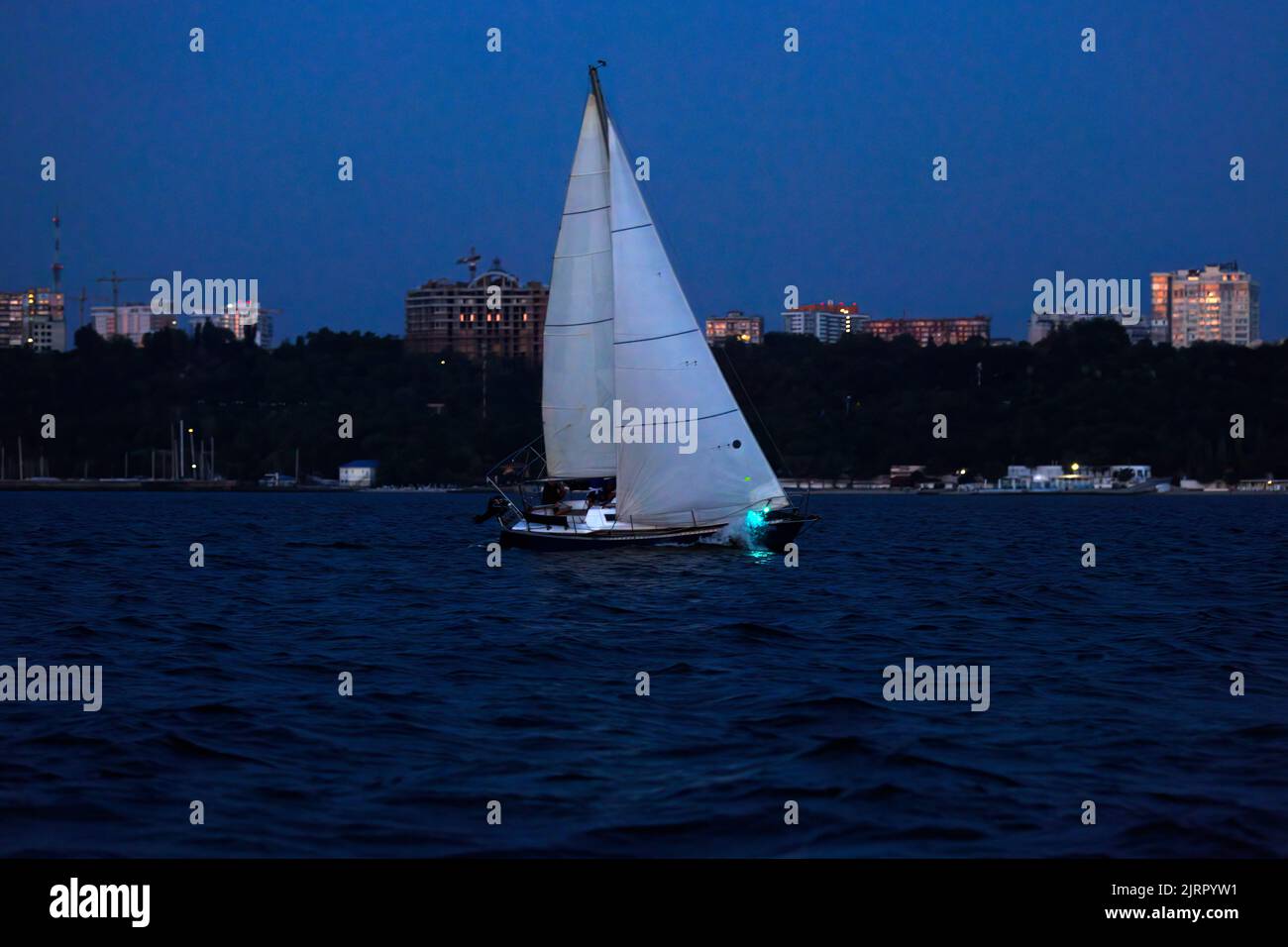 sailing yacht at night Stock Photo - Alamy