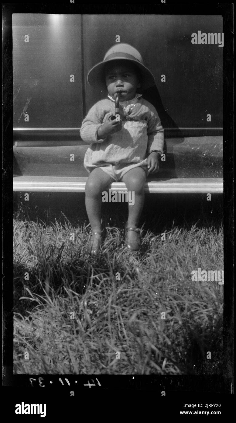 Tihi Kuiti's little boy smoking a pipe, 14 November 1937, by Leslie ...